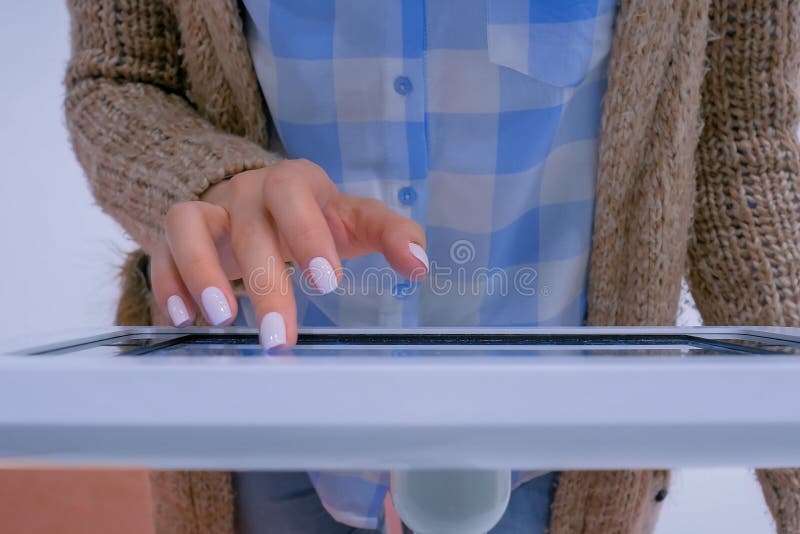 Woman Hand Using Touchscreen Display of Floor Standing White Tablet ...