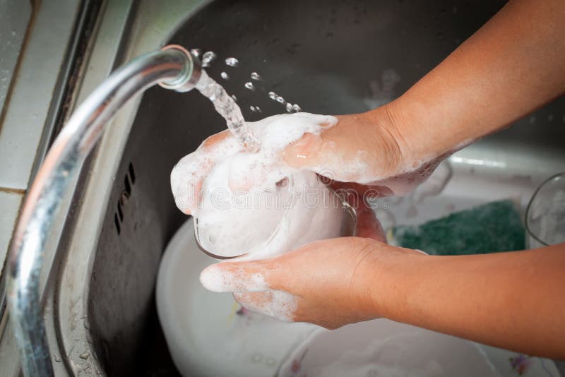 Woman Hand Washing Glass Over the Sink Stock Photo - Image of foam ...