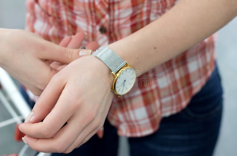 Woman hand with a watch stock image. Image of minute - 39089389