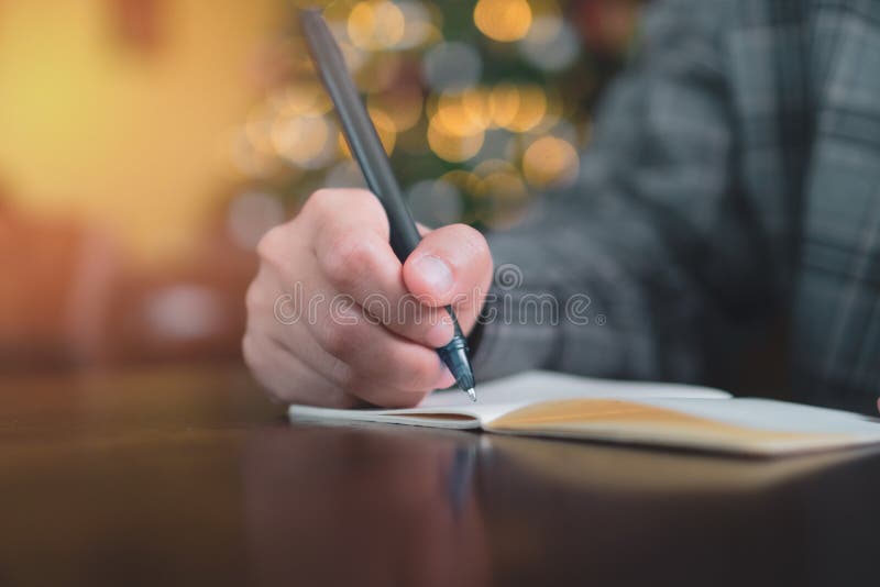 Woman Hand Writing Down in Small White Memo Notebook for Take a Note ...