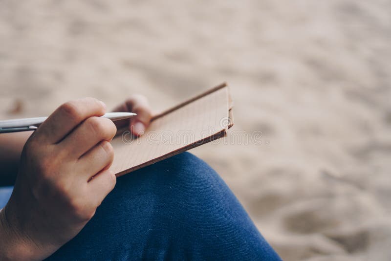 Woman Hand Writing Down in Small White Memo Notebook for Take a Note ...