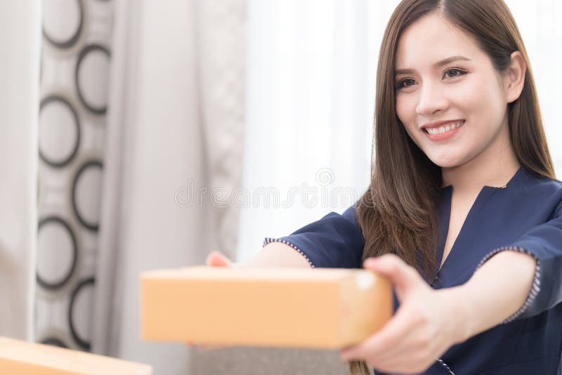 Woman Handing Over the House Keys Inside Empty Room Stock Image - Image ...