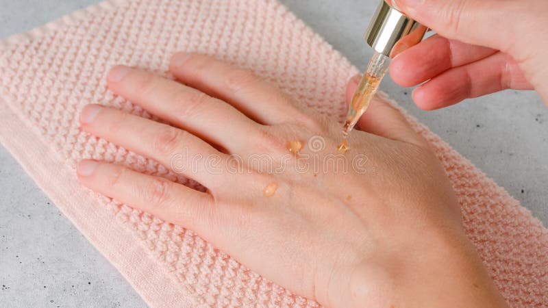 Woman Hands Applying Glow daily Serum, Close-up Stock Image - Image of ...