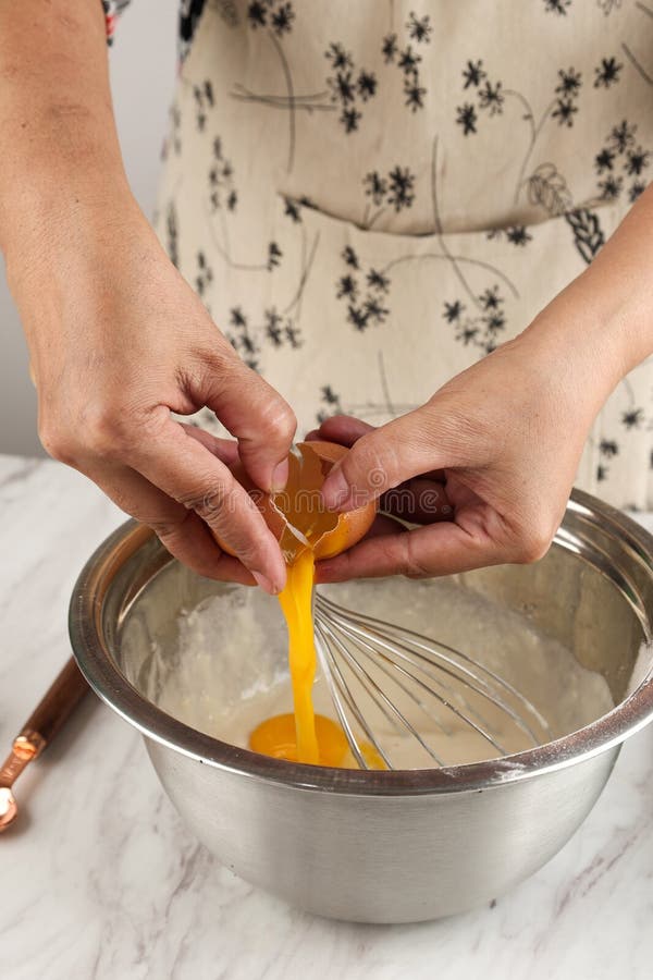 Woman Hands are Breaking Eggs for Baking on the Table Stock Image ...