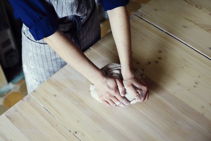 Woman Hands Close-up, Forming Crude Clay in a Potter`s Workshop Studio ...