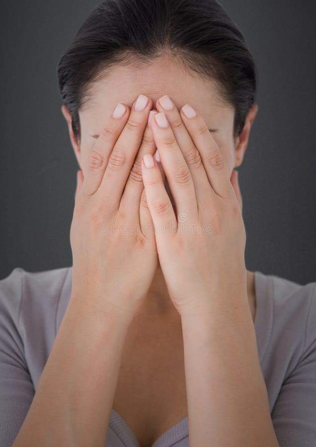 Woman Crying into Tissue Against Grey Wall Stock Image - Image of ...