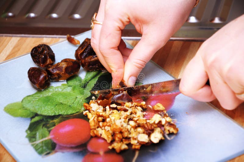 Woman Hands Cutting Dates and Walnut Stock Photo - Image of sweet ...