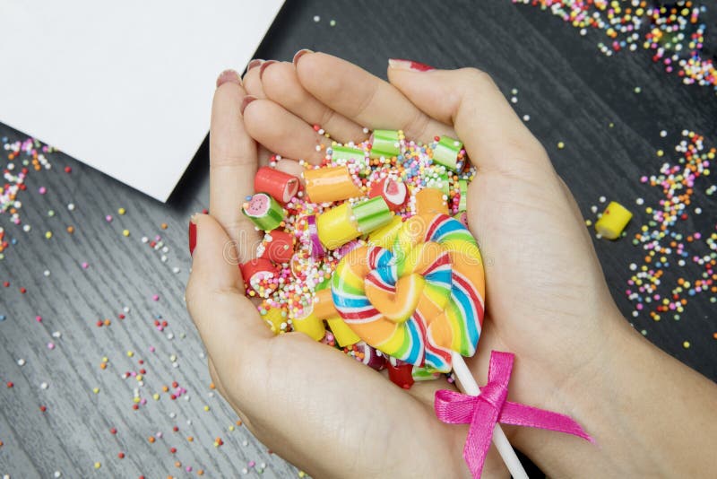 Woman Hands Holding Assorted Colorful Candies Stock Image - Image of ...