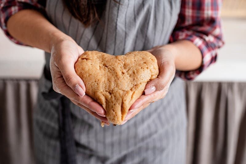 Woman Hands Holding Heart Shaped Dough Stock Photo - Image of domestic ...