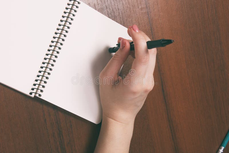 Woman Hands Holding Pen Down Up . Top View with Copy Space Stock Photo ...