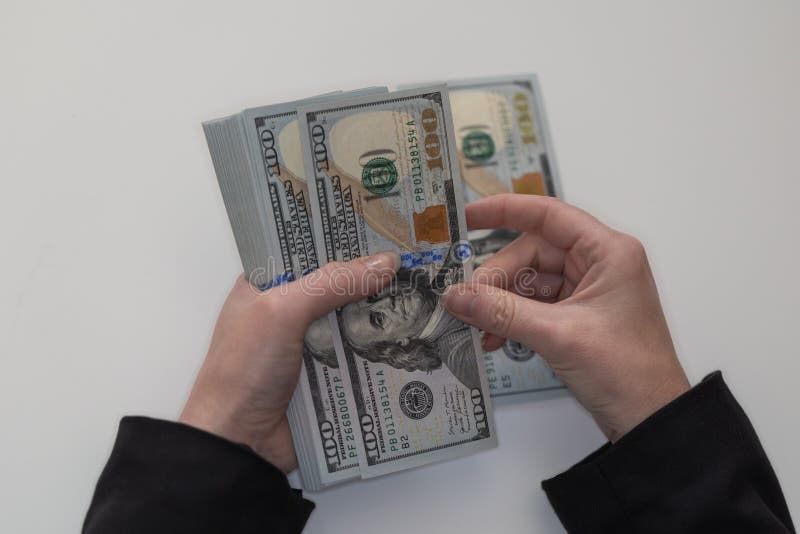 Woman Hands Holding Pile of 100 US Dollar Banknotes Stock Photo - Image ...