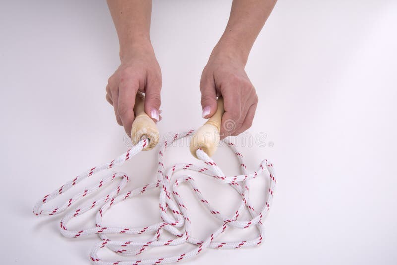 Woman hands with jump rope stock photo. Image of training - 81438128