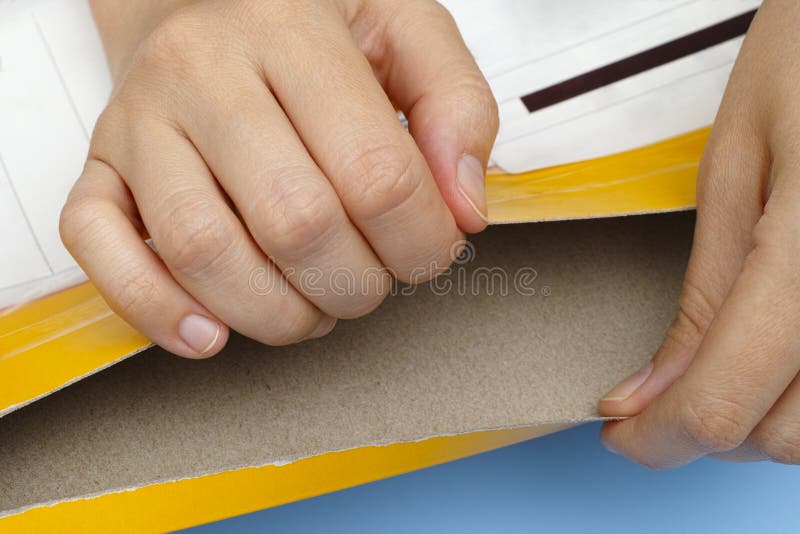 Woman Hands Open Yellow Package Stock Photo - Image of post, empty ...