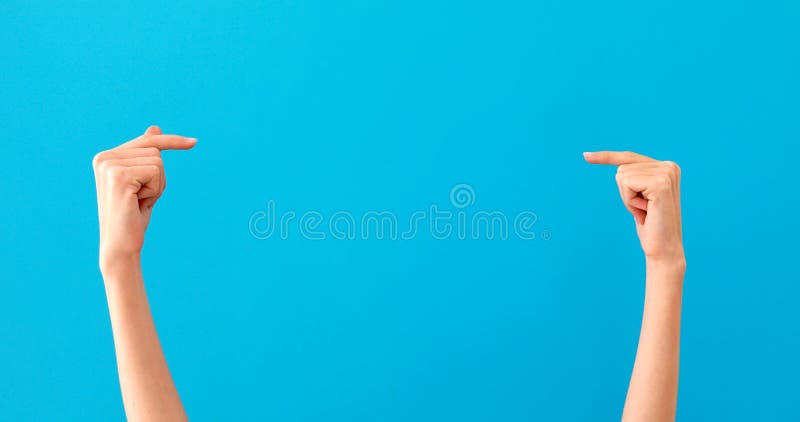 Woman Hands Pointing on Copyspace Isolated Blue Stock Photo - Image of ...