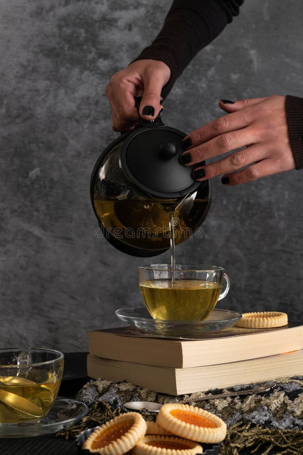 Woman Hands Pouring Tea from a Teapot Stock Photo - Image of kettle ...