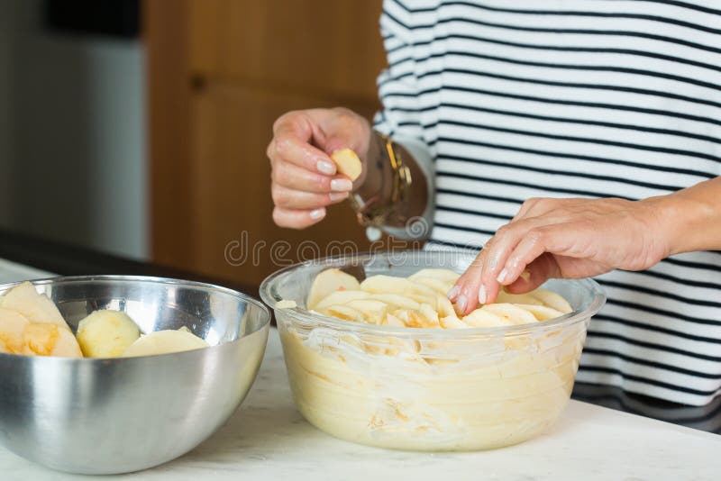 Woman Hands Putting Apples while Cooking Apple Pie Stock Photo - Image ...