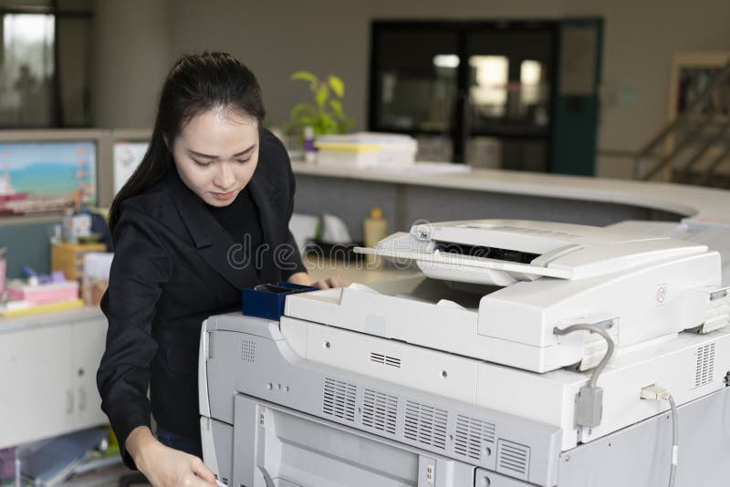 Woman Hands Putting a Sheet of Paper into a Copying Device or Printer ...