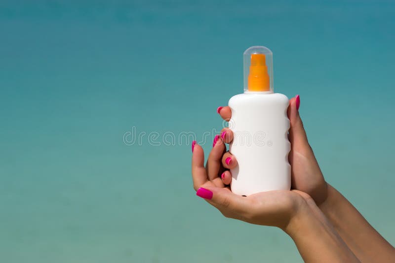 Woman Hands Putting Sunscreen from a Suncream Bottle Stock Photo ...