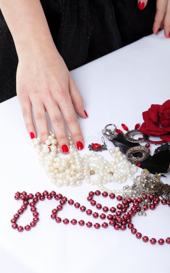 Woman Hands a Red and White Bead Stock Image - Image of shiny ...