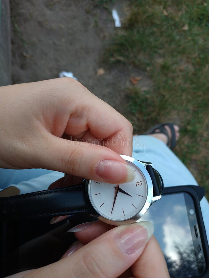 A Woman Hands Set Her Silver Watch Stock Image - Image of jewelry ...