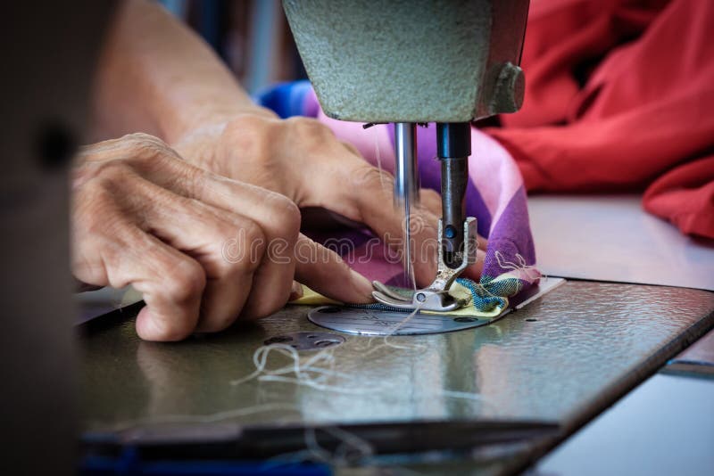 Woman Hands Sewing Fabric Repairs on Old Sewing Stock Image - Image of ...