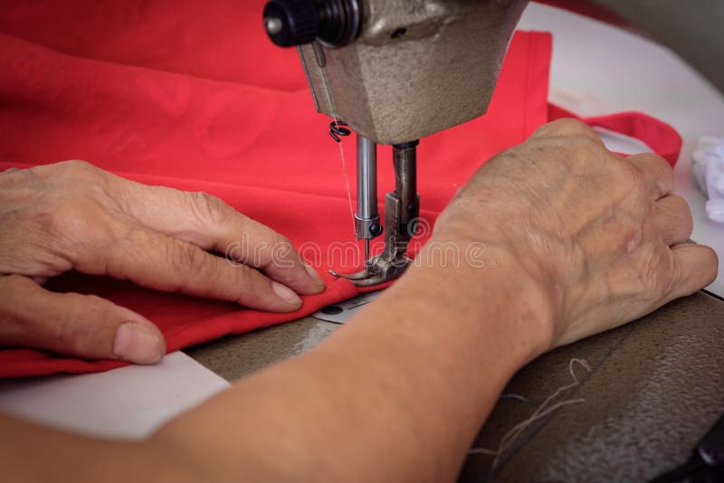 Woman Hands Sewing Fabric Repairs on Old Sewing Stock Photo - Image of ...