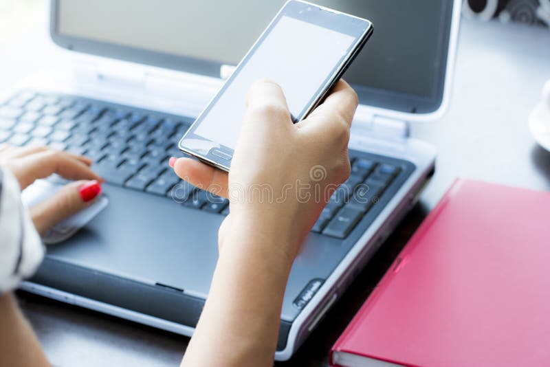 Woman Hands with Smart Phone and Computer at Office Stock Image - Image ...