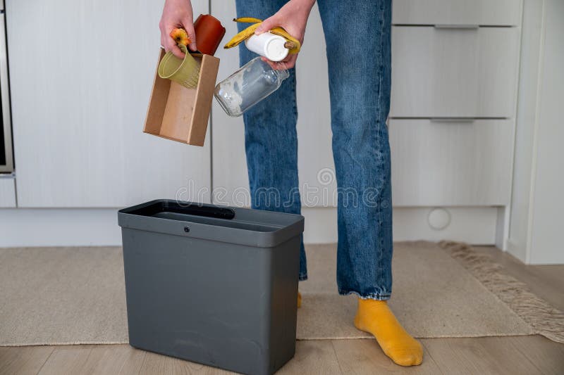 Woman Hands Throwing Out Cardboard, Glass, Plastic and Bio Garbage into ...