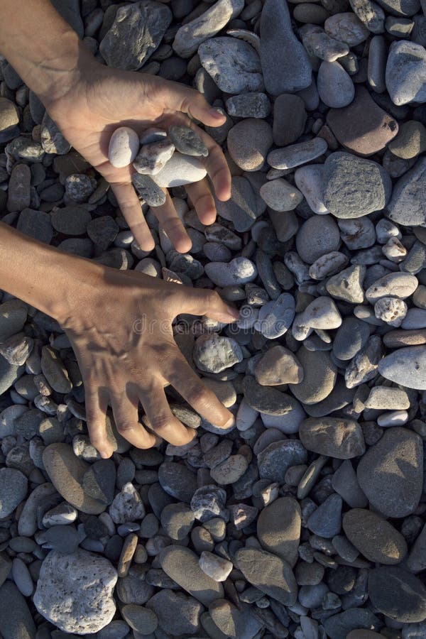 Woman Hands Touching Stones on the Beach Stock Photo - Image of ...