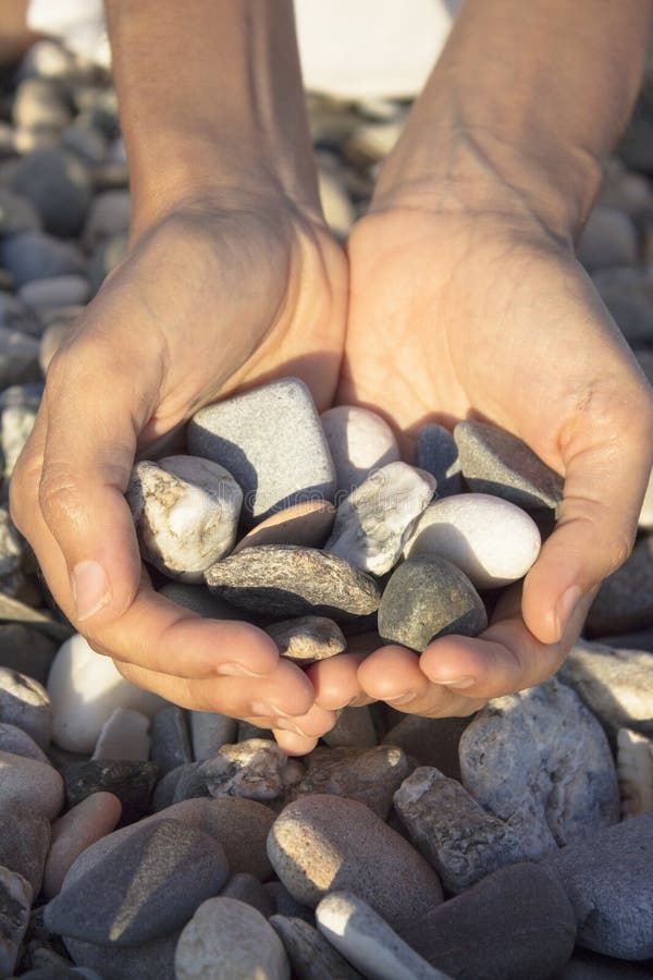 Woman Hands Touching Stones on the Beach Stock Photo - Image of hand ...