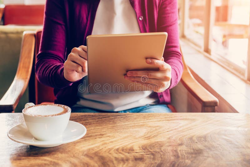 Woman Hands Using and Holding Computer Tablet in Coffee Shop Stock ...