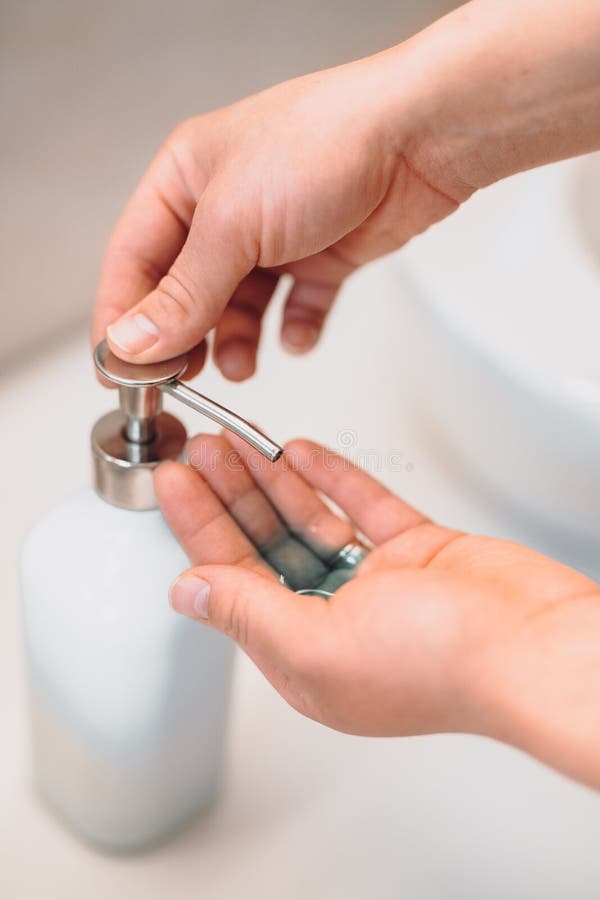 Woman Hands Using Soap Dispenser for Washing Hands at Home Stock Image ...