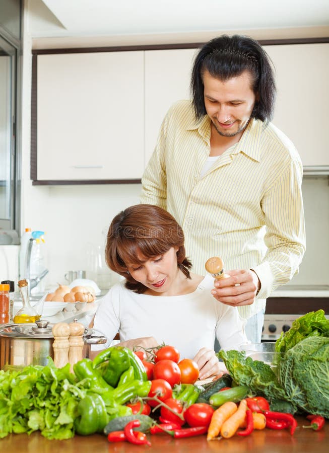 Woman and Handsome Husband Cooking Together Stock Photo - Image of ...