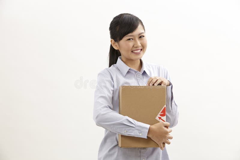 Woman holding a box stock image. Image of postal, woman - 105789655