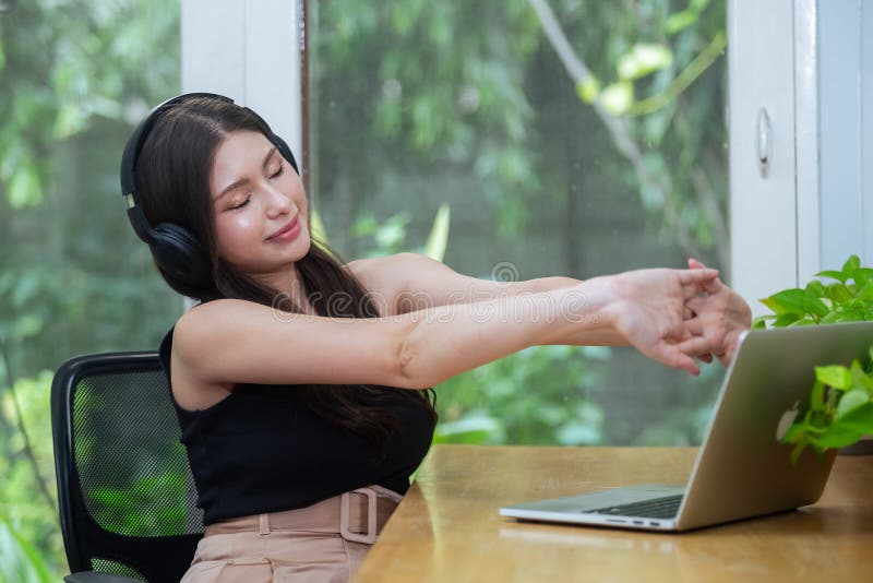 Woman Has Aches and Pains while Working and Using the Computer Laptop ...