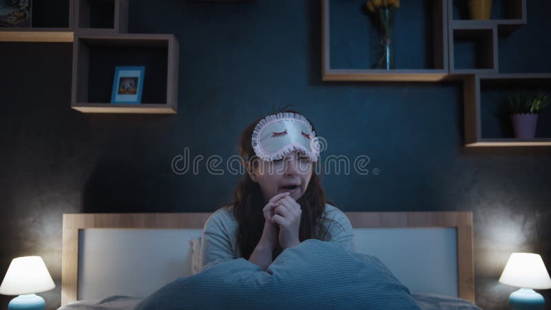 Woman Has Insomnia, Woman Sitting on Bed at Night and Thinking about ...