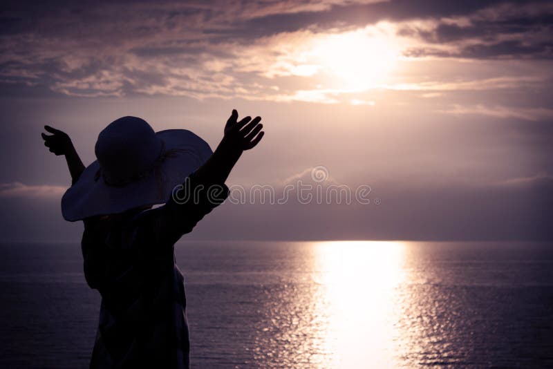 Woman in Hat with Raised Hands Looking at Sunset Stock Image - Image of ...