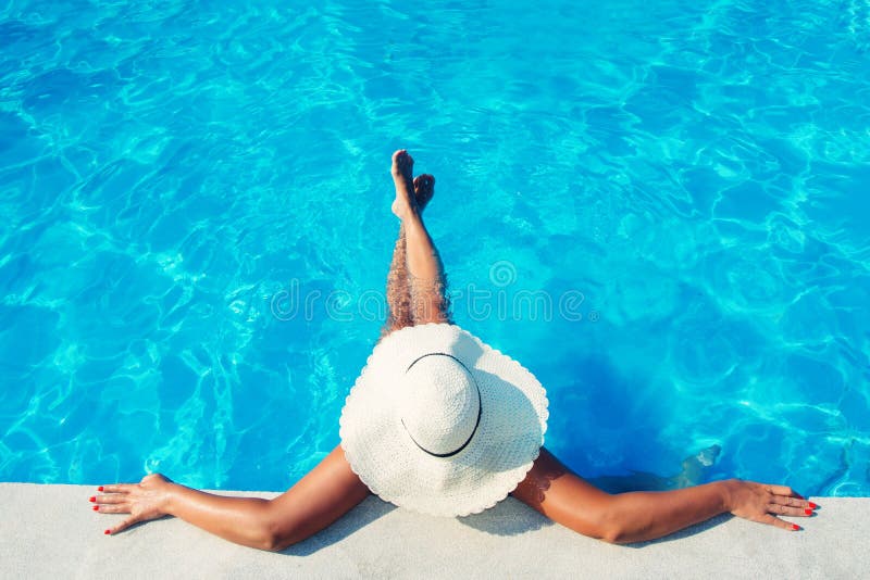 Woman in Hat Relaxing at the Pool Stock Photo - Image of caucasian ...