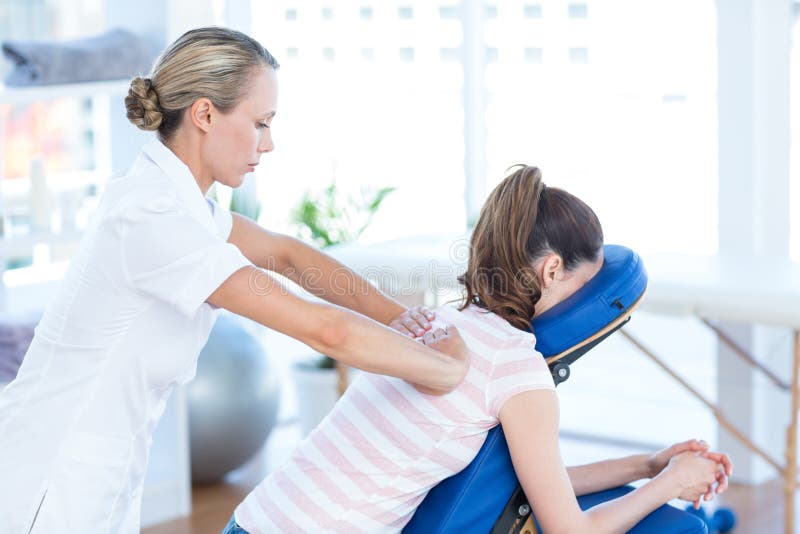 Woman having back massage stock photo. Image of relaxing - 53066398