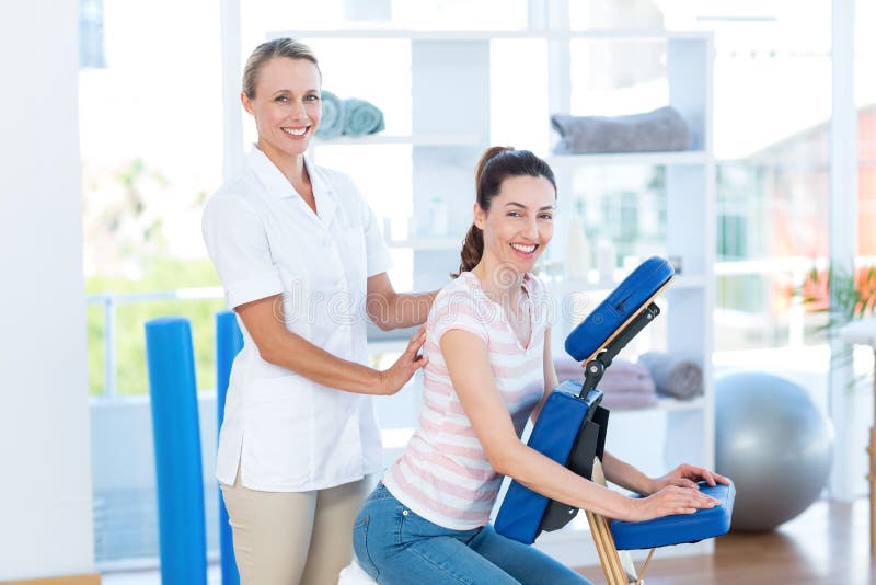 Woman having back massage stock image. Image of hands - 53074211