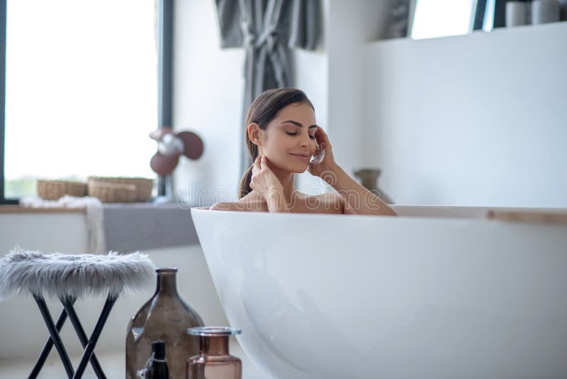 Woman Having a Bath and Looking Relaxed Stock Image - Image of ...