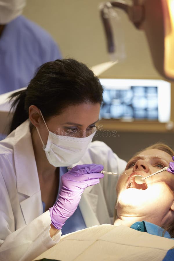 Woman Having Check Up at Dentists Surgery Stock Image - Image of girl ...