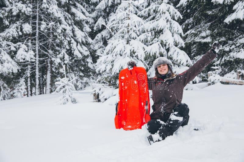 Woman Having Fun in Heavy Snow with a Sleigh Stock Image - Image of ...