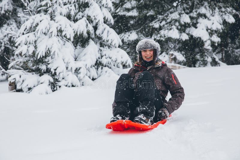 Woman Having Fun in Heavy Snow with a Sleigh Stock Image - Image of ...