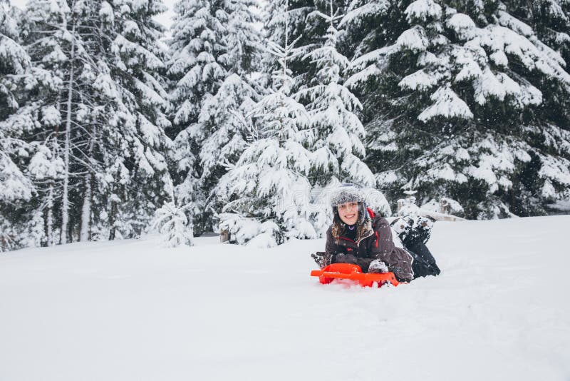 Woman Having Fun in Heavy Snow with a Sleigh Stock Image - Image of ...