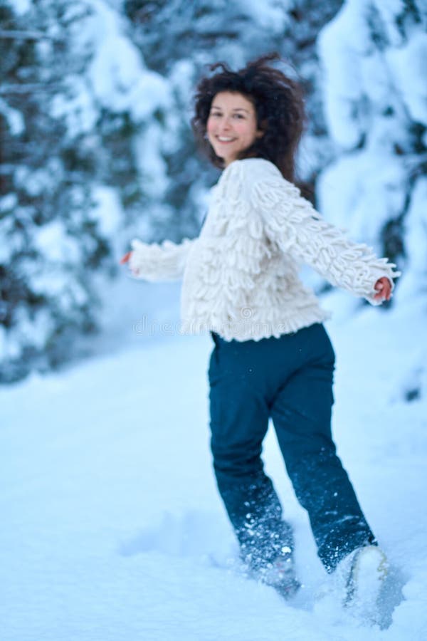 The Woman Having Fun Walking in Snow Covered Winter Forest Stock Image ...