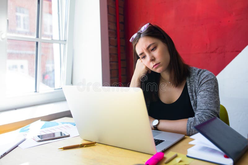 Woman Having Problem on Work , Sitting at Desktop with Laptop Computer ...