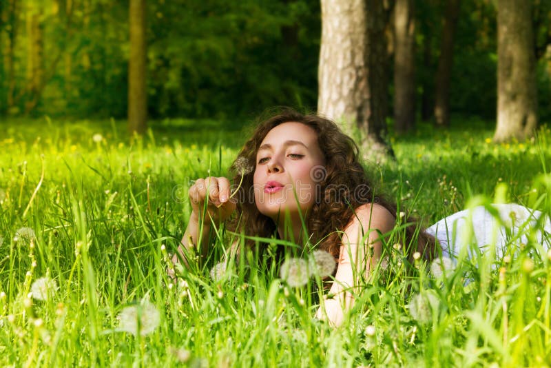 Woman Having Rest on Meadow Stock Photo - Image of beauty, female: 71539788