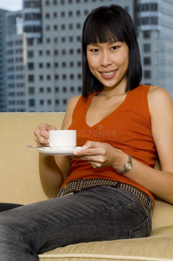 Woman Having Tea stock image. Image of teapot, sitting - 2031257