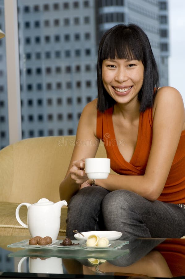 Woman Having Tea stock photo. Image of sitting, female - 2031268